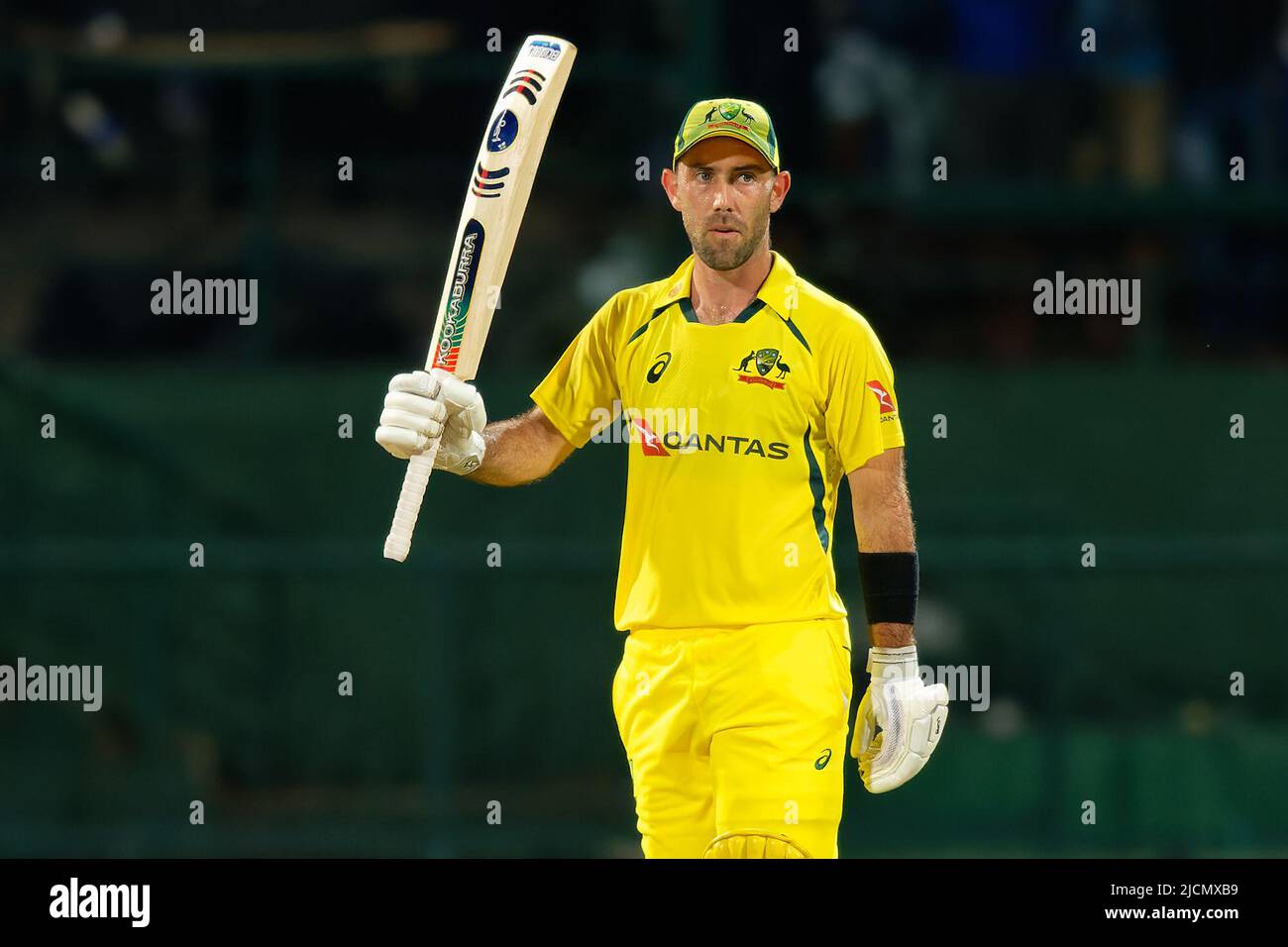Kandy, Sri Lanka. 14th June 2022. Australia's Glenn Maxwell raises his ...