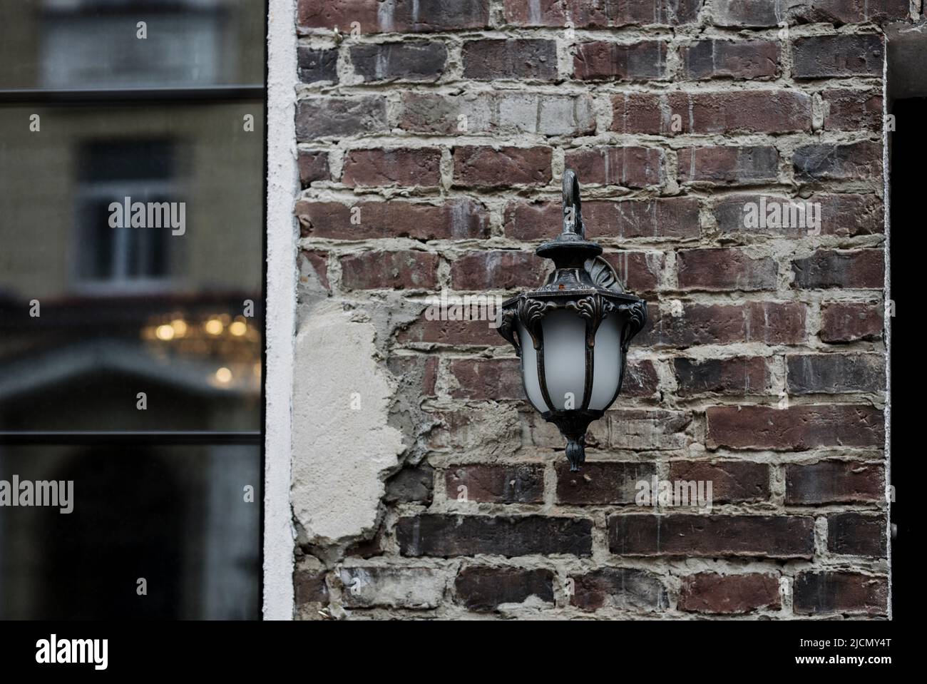 Old street light lantern on brick wall. antique lamp Stock Photo - Alamy