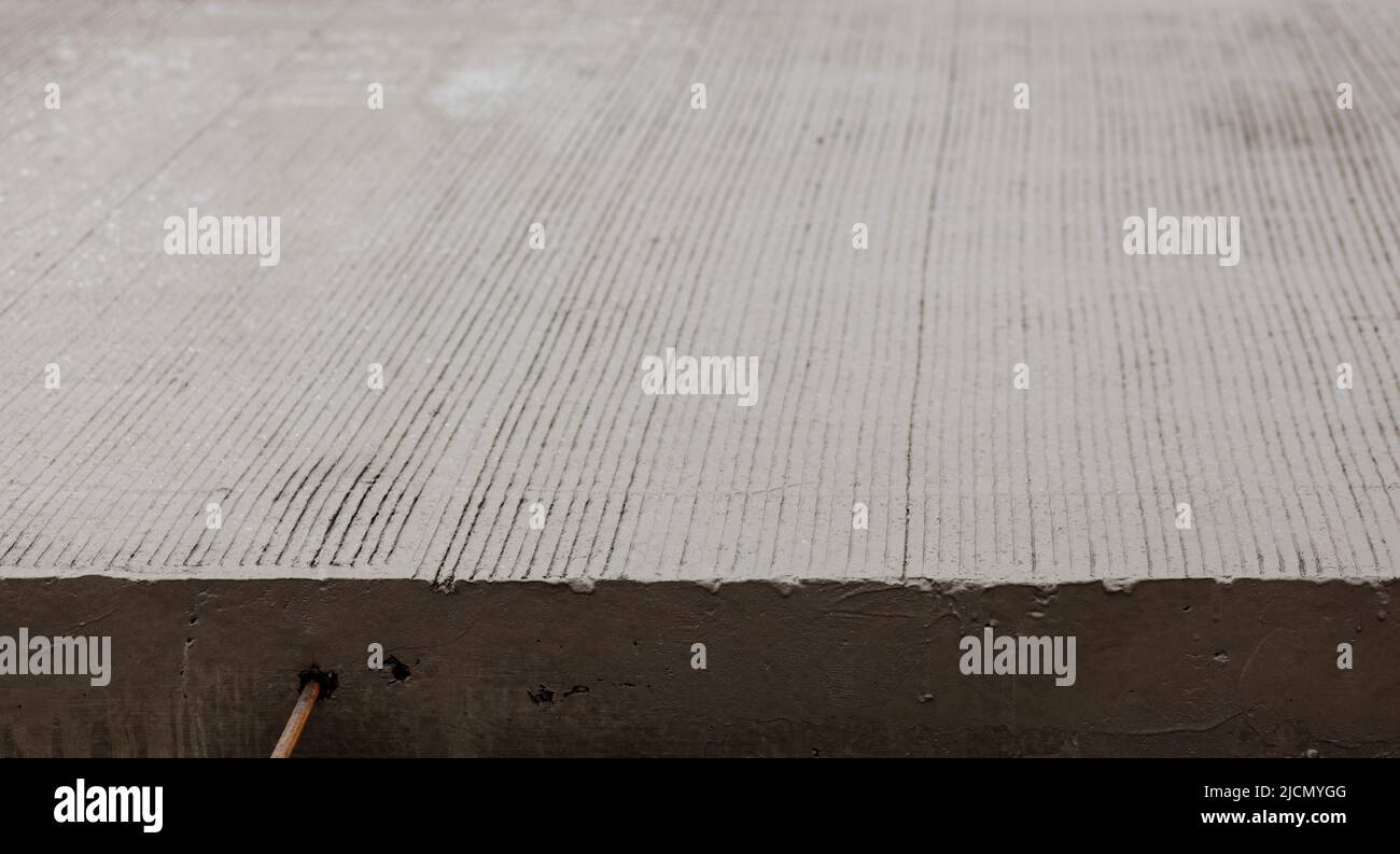 new concrete pavement. cement for sidewalk. construction concept Stock ...
