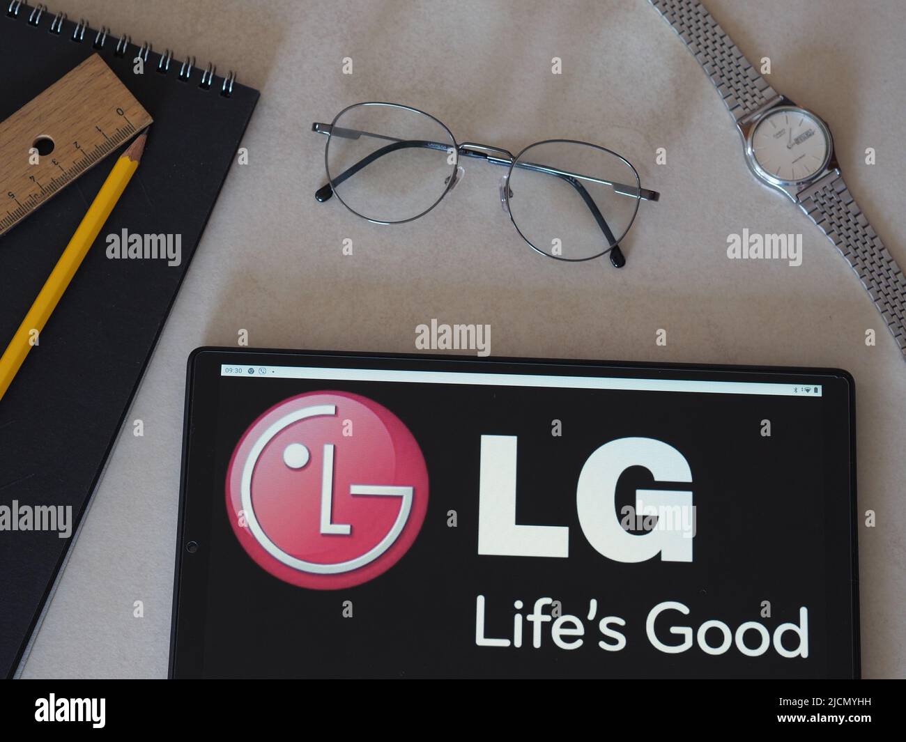 In this photo illustration LG Group logo seen displayed on a tablet ...