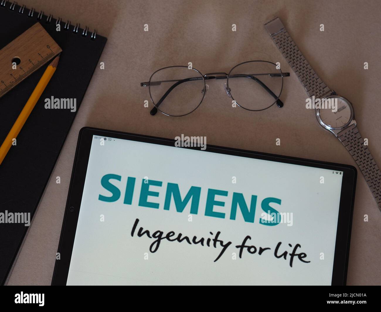In this photo illustration Siemens Group logo seen displayed on a ...