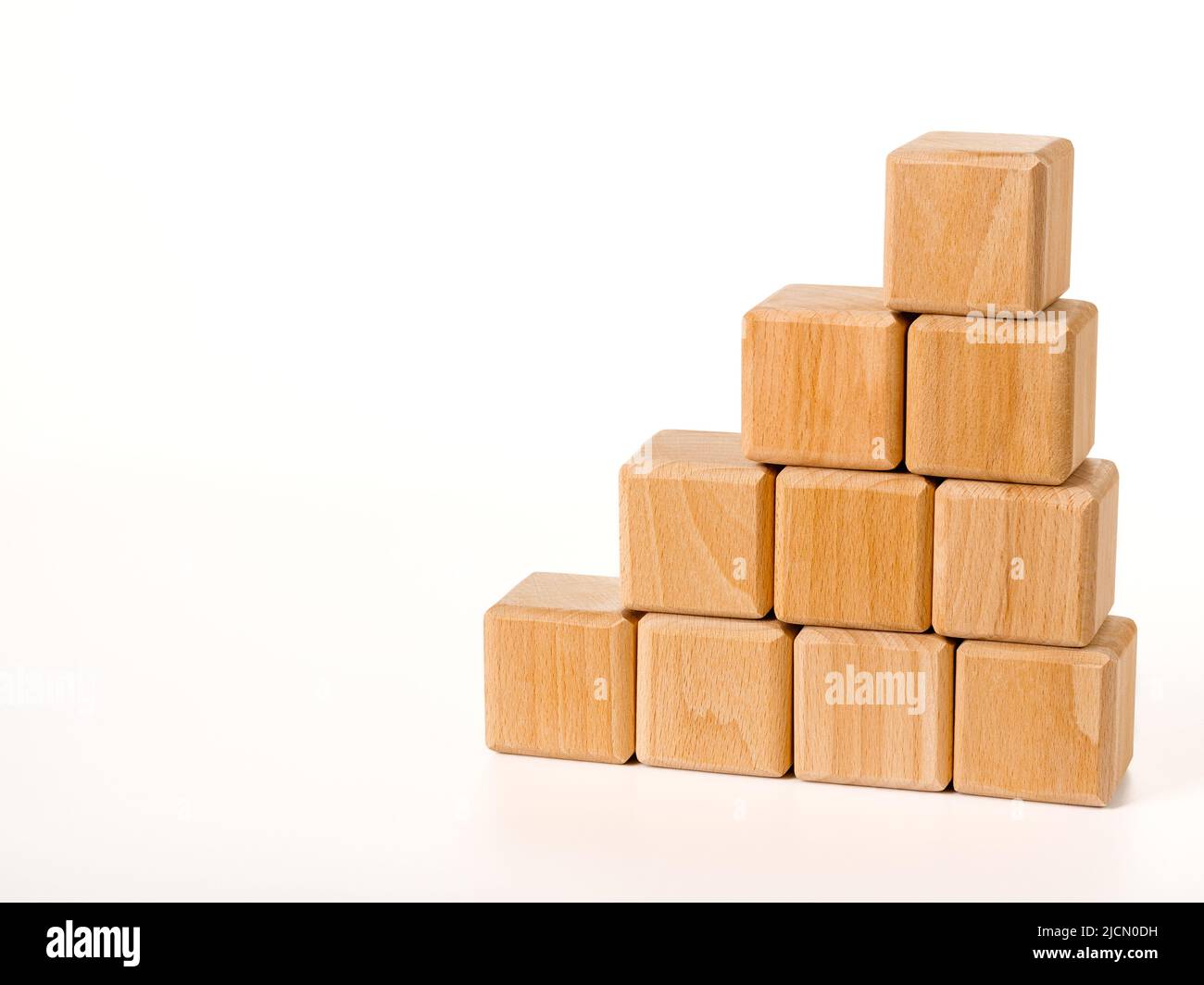 Pyramid of wood cubes hi-res stock photography and images - Alamy