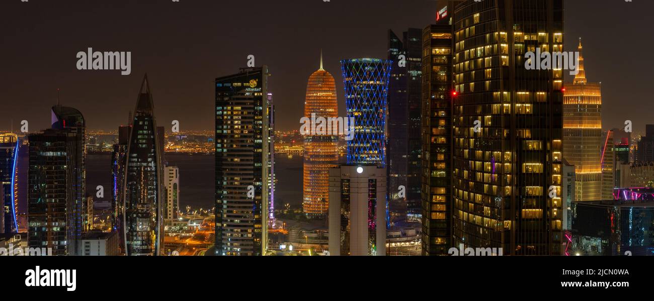 Doha, Qatar- may 05, 2022 : Doha city with many colorful towers during ...