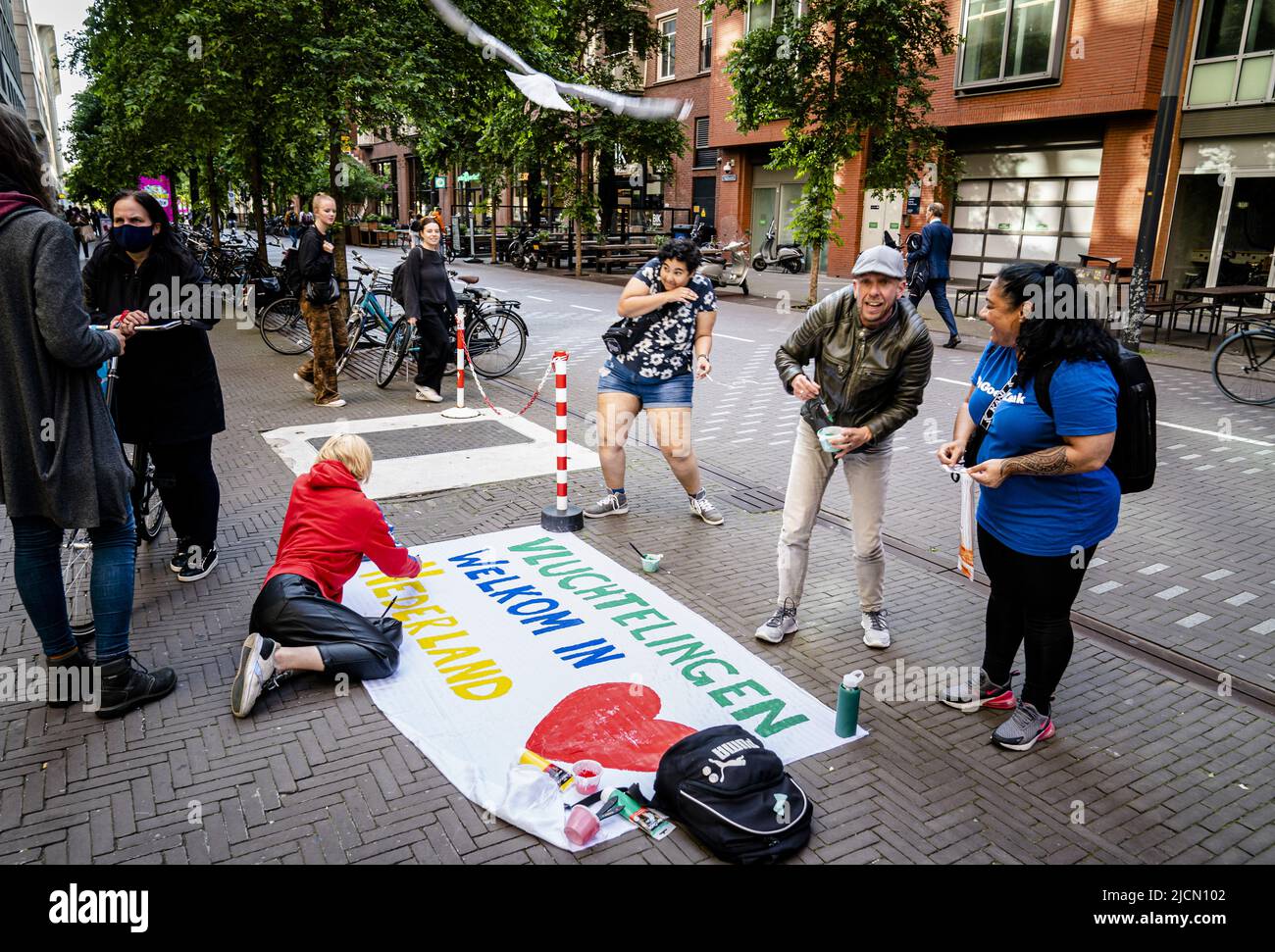 2022-06-14 19:06:33 THE HAGUE - Protesters on a folding chair during a ...