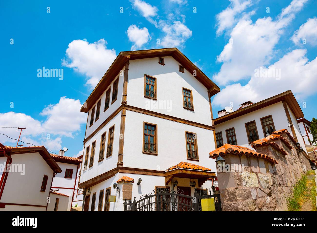 Traditional Turkish houses in the Ankara Castle with cloudy sky ...