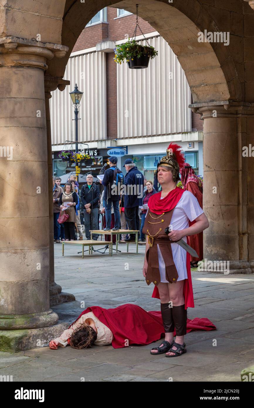 A Roman soldier stands guard over the body of Christ during The Passion ... A Roman soldier stands guard over the body of Christ during The Passion ...