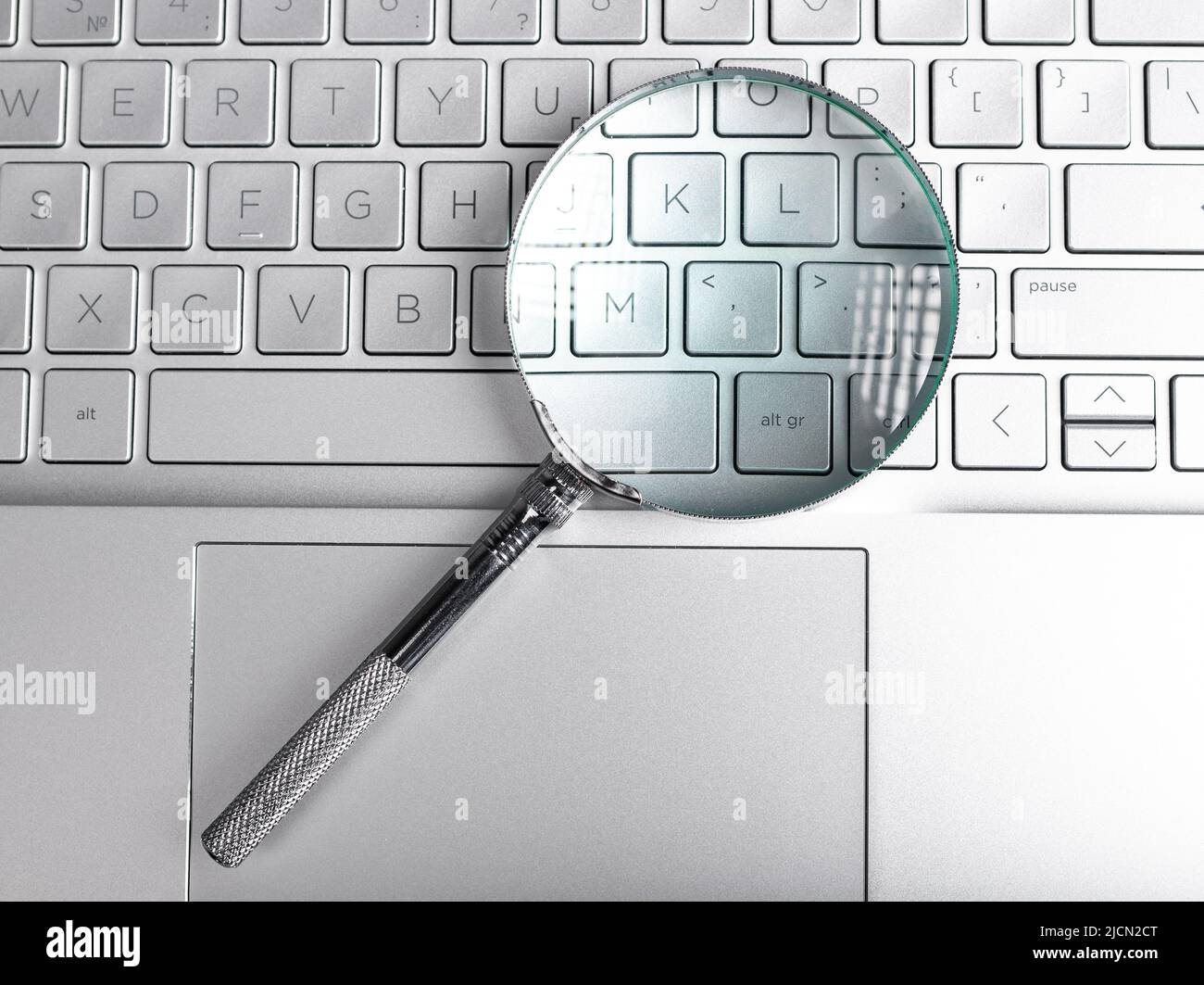 Magnifier over keyboard hi-res stock photography and images - Alamy