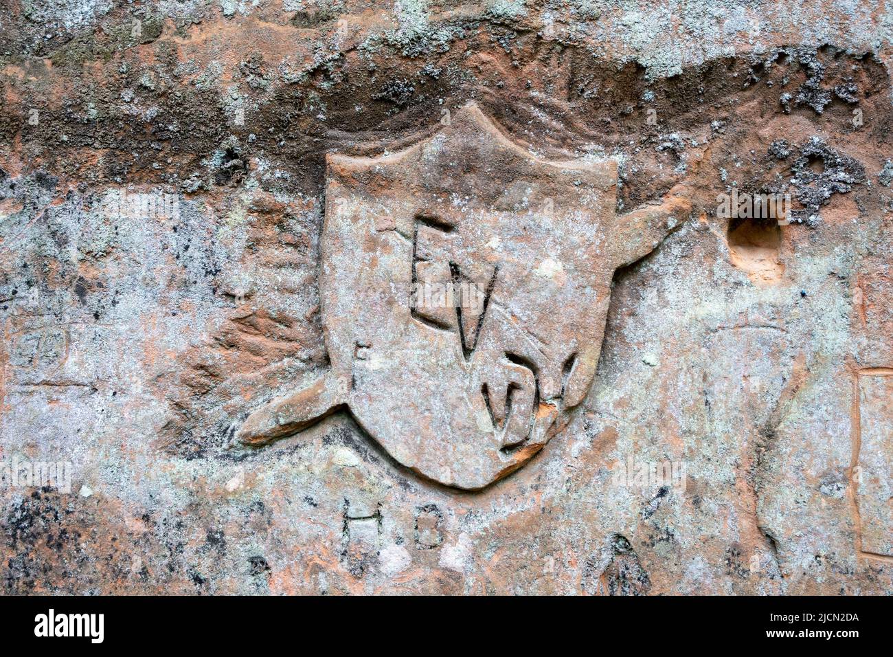 A symbol engraved on the rock. Sandstone cliffs is approximately one ...