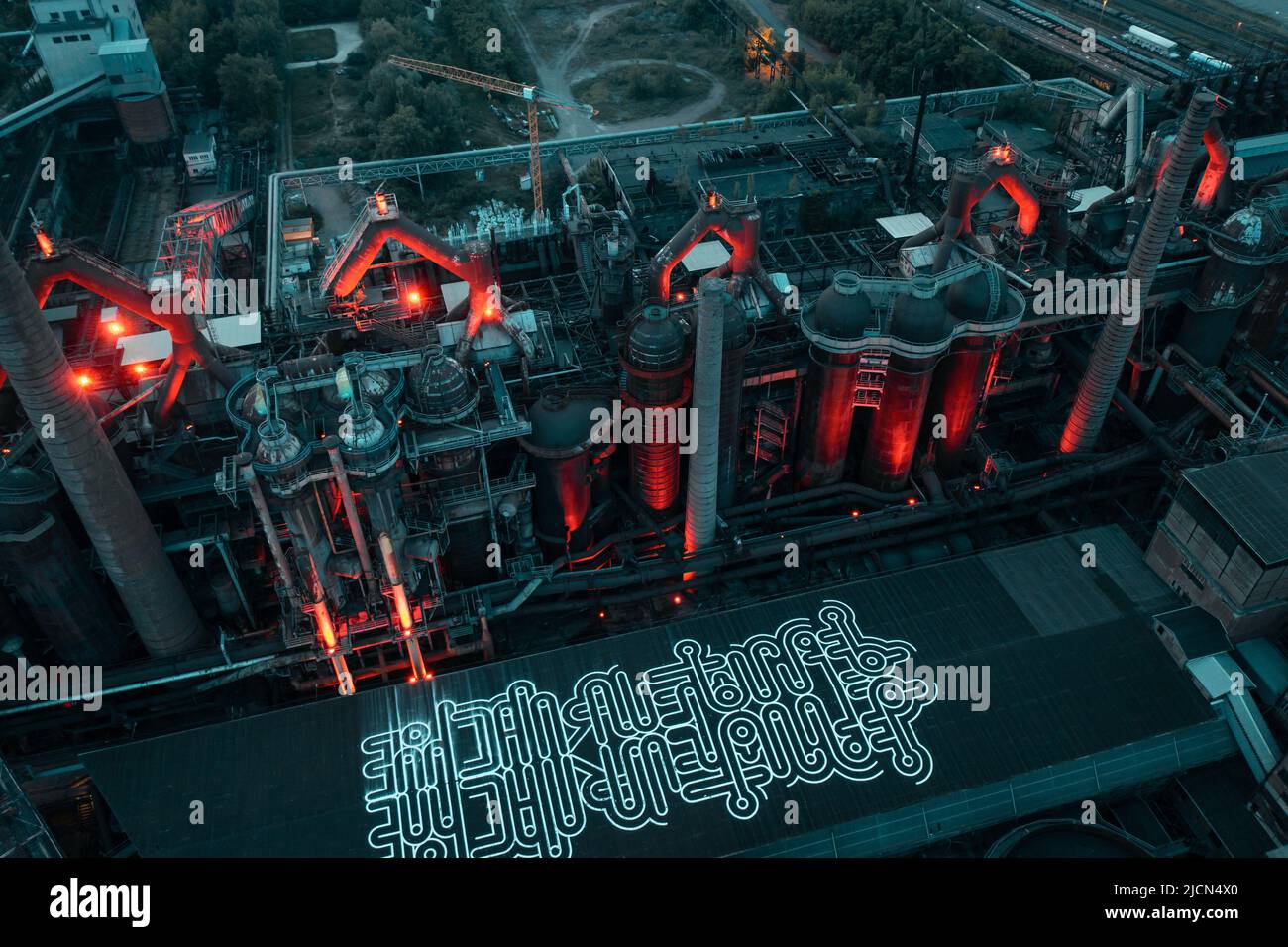 Aerial view of the Voelklingen Ironworks Unesco World Heritage Site red with the night red ...