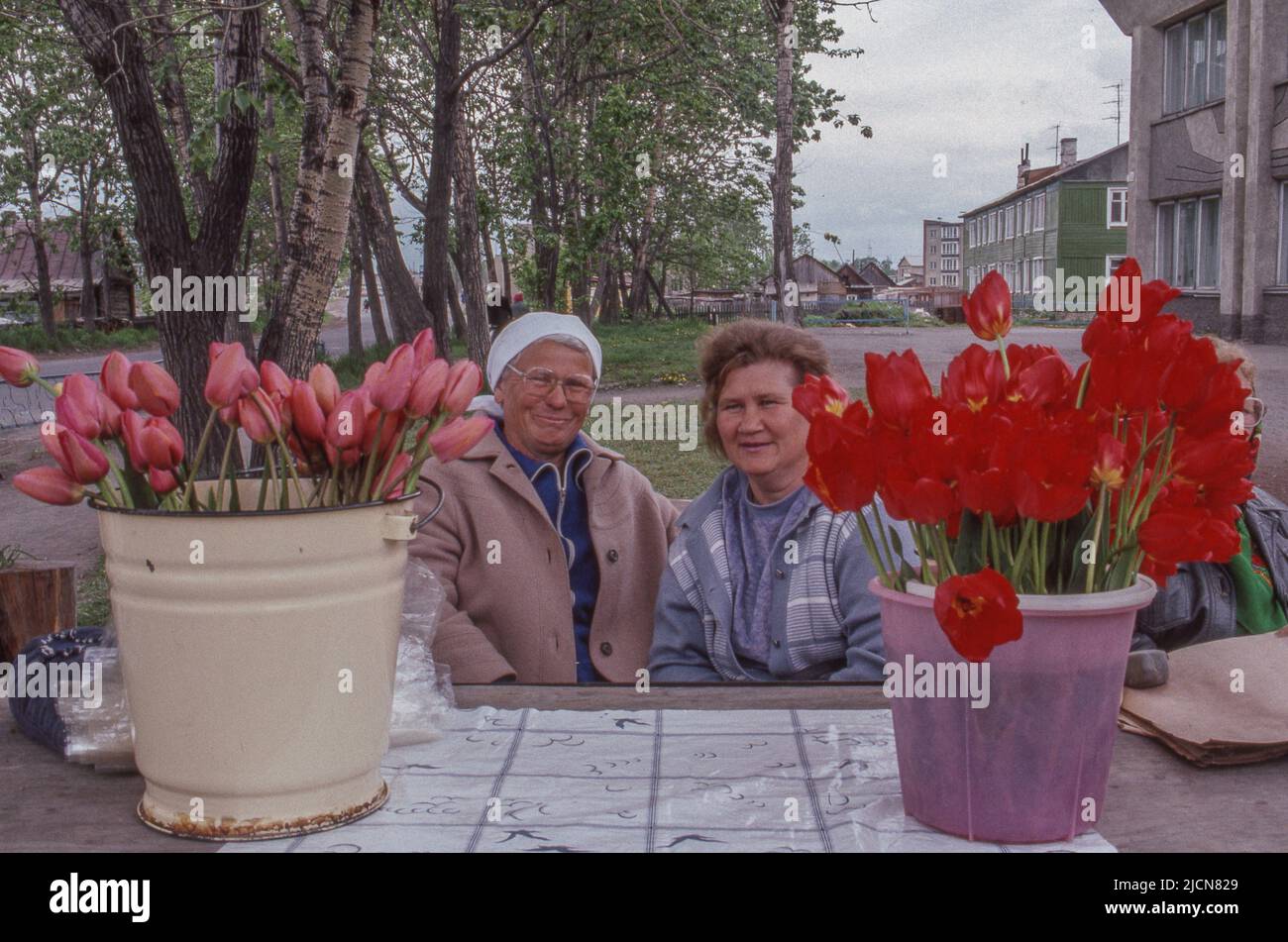 Women selling flowers, village of Esso, Kamchatka Peninsula, Russia ...