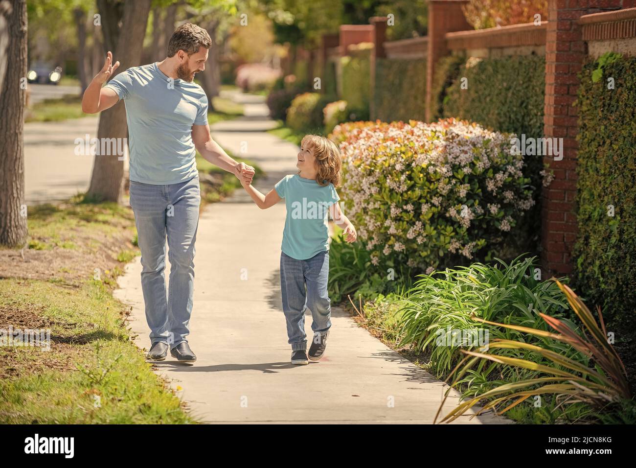 happy dad with child walk together in park, summertime Stock Photo - Alamy