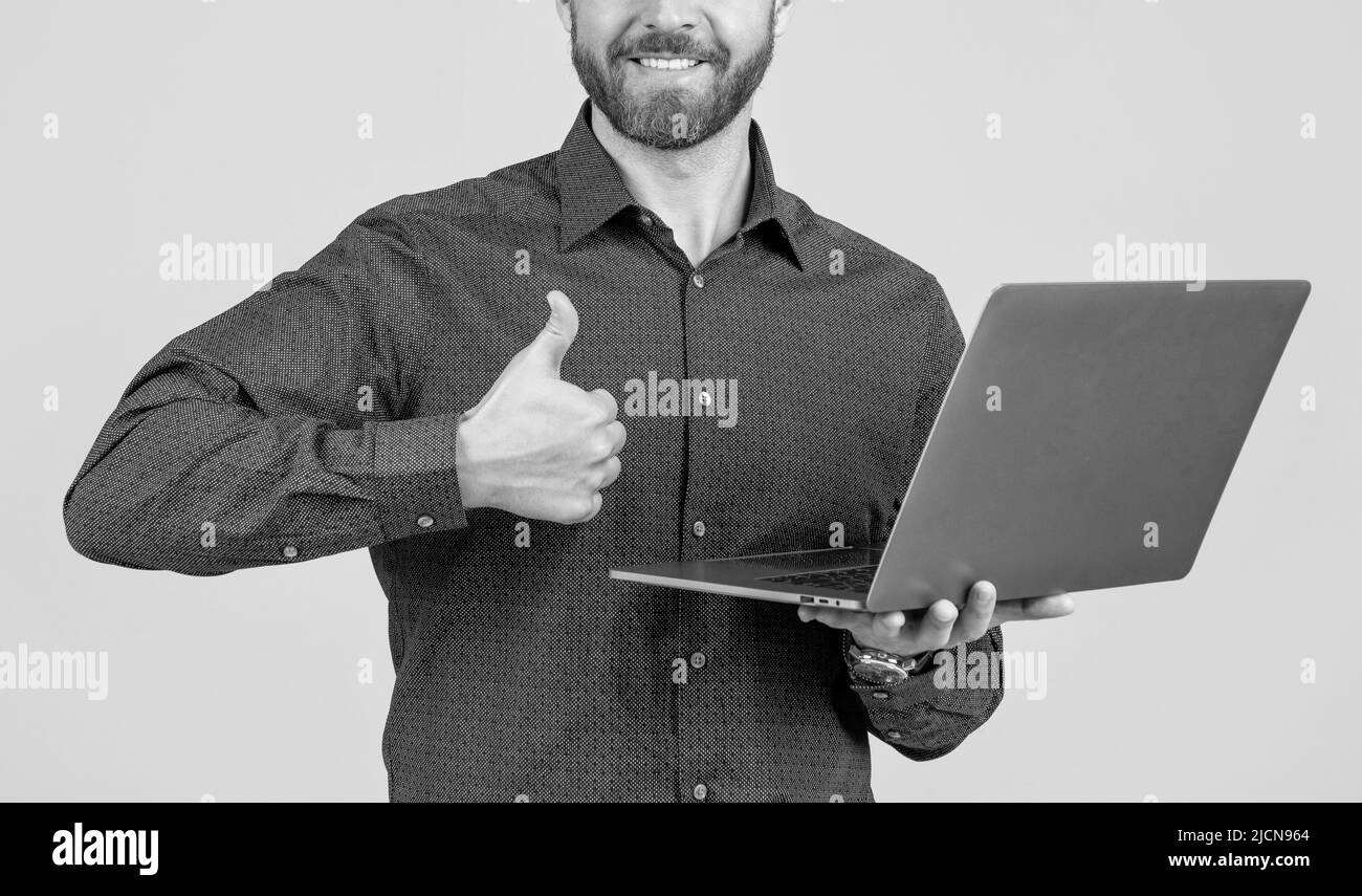 Unshaven man cropped view show thumbs up hand gesture holding portable ...