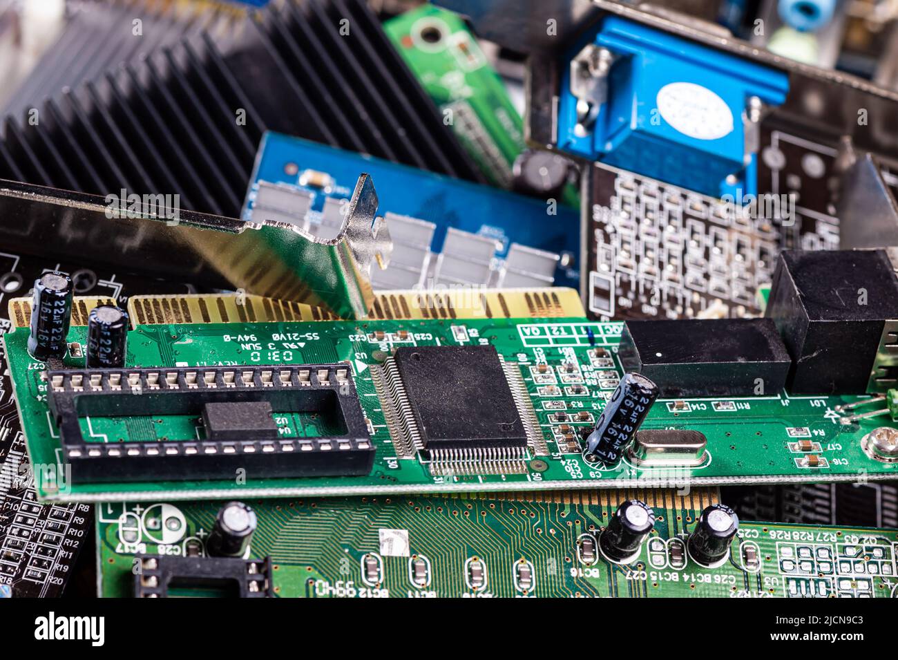 stack with various computer electrical boards and components, Repairing ...