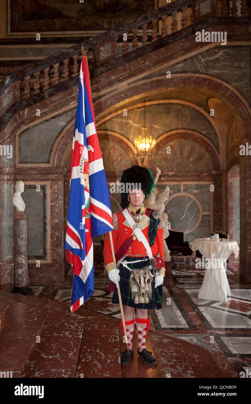 An officer with the colours of the 92nd (Gordon Highlanders) Regiment ...
