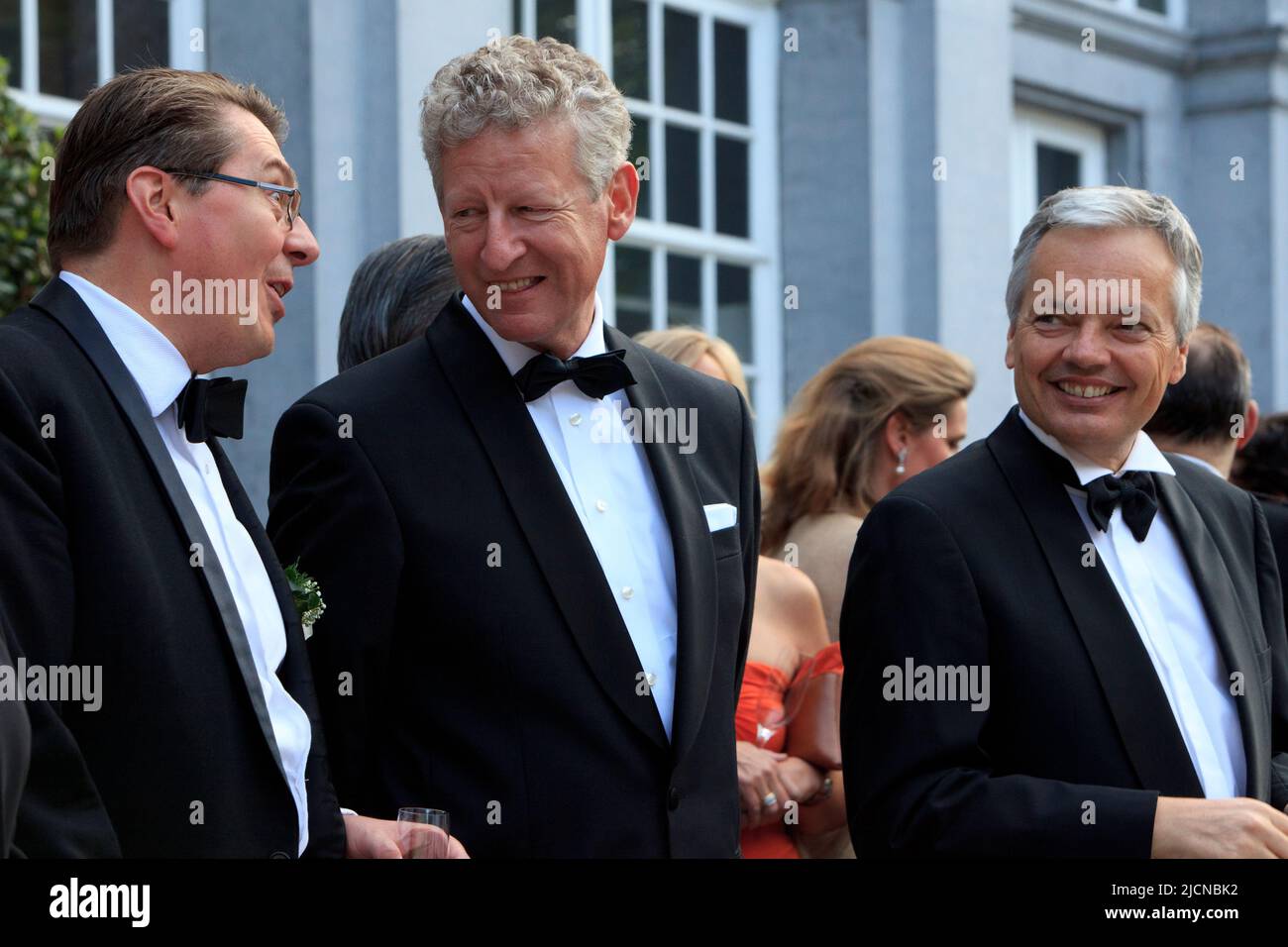 British ambassador Jonathan Brenton and Belgian ministers Pieter De ...
