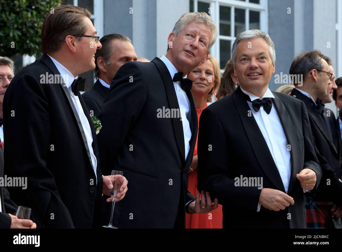 British ambassador Jonathan Brenton and Belgian ministers Pieter De ...