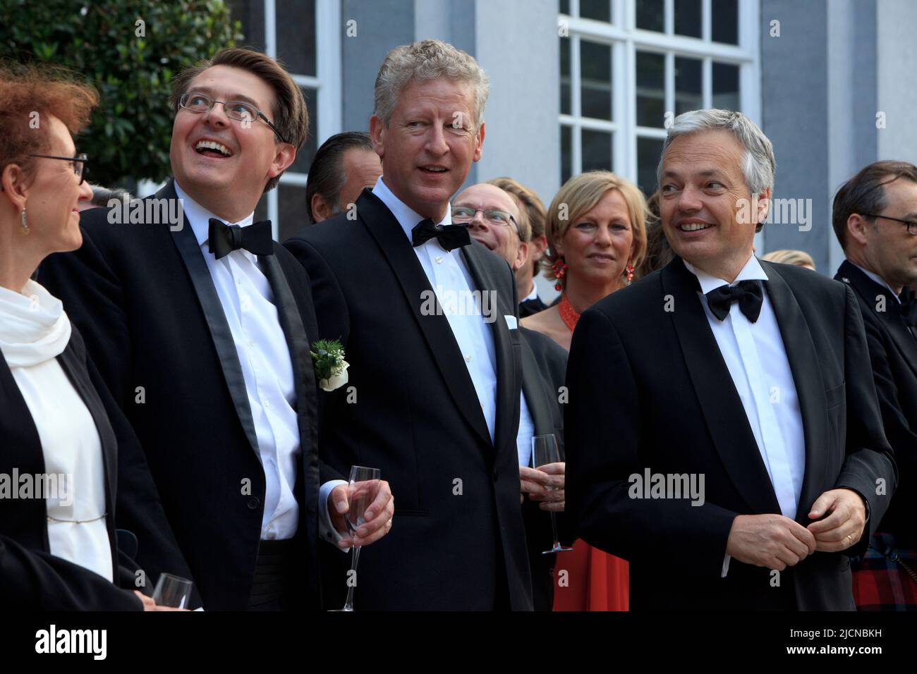 British ambassador Jonathan Brenton and Belgian ministers Pieter De ...