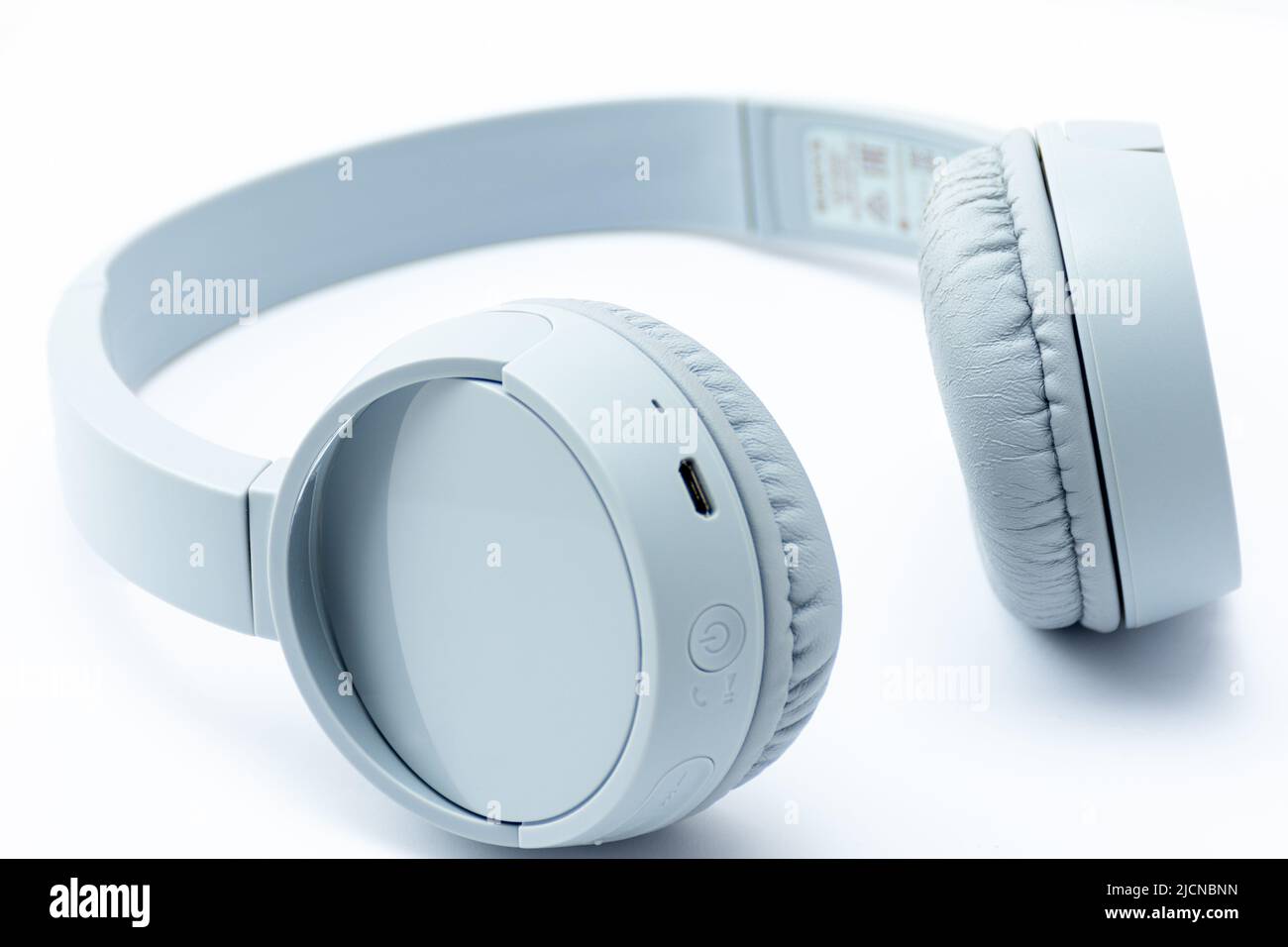 Close up of gray wireless headphones isolated on white background Stock ...