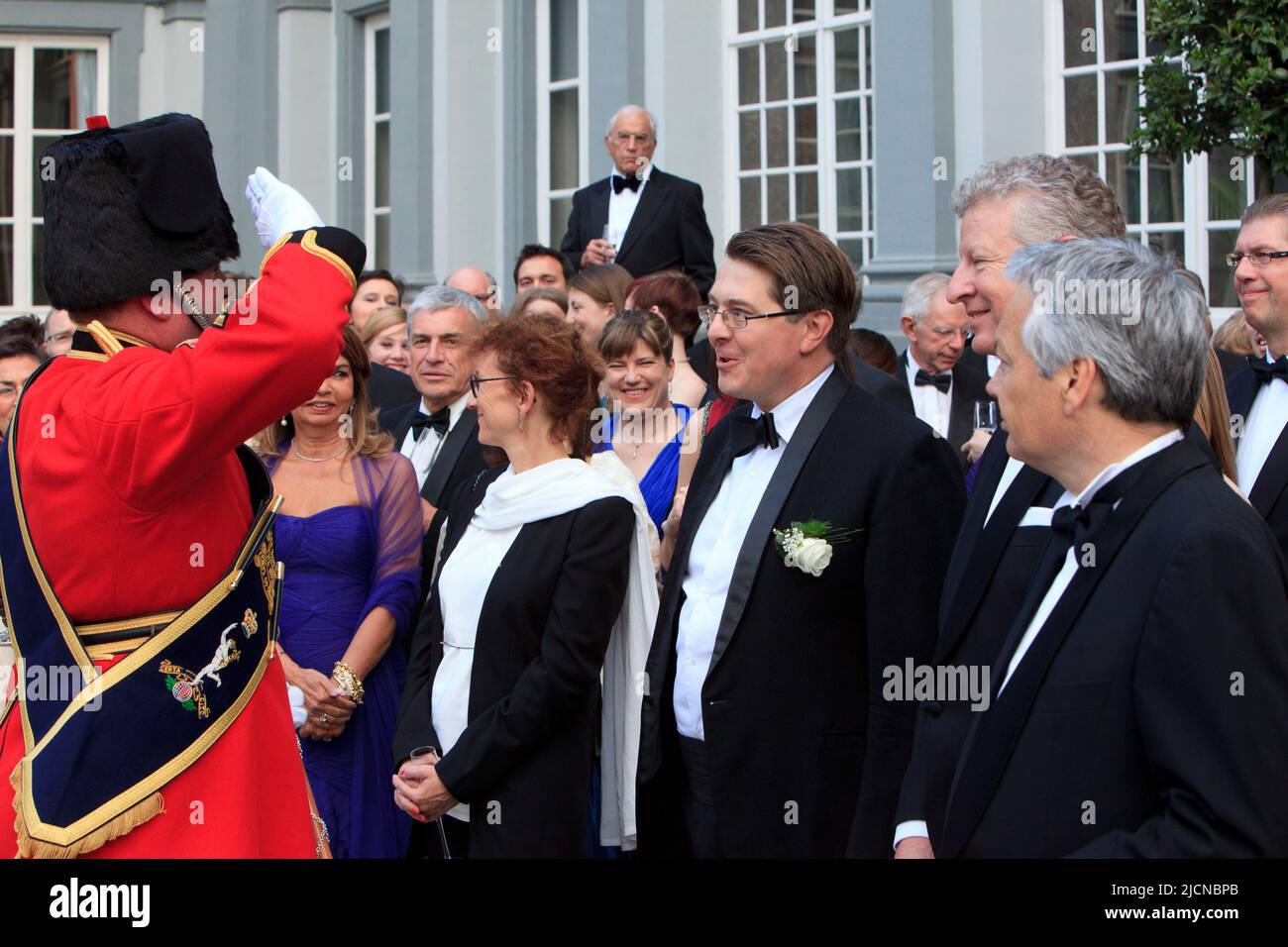 British ambassador Jonathan Brenton and Belgian ministers Pieter De ...