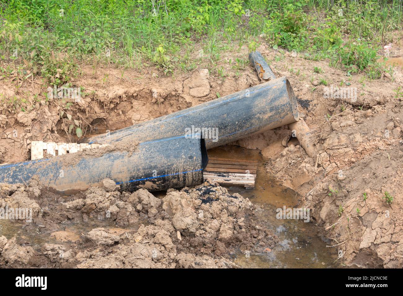 Laid pipes for water supply and sewerage. The ends of the pipes are ...
