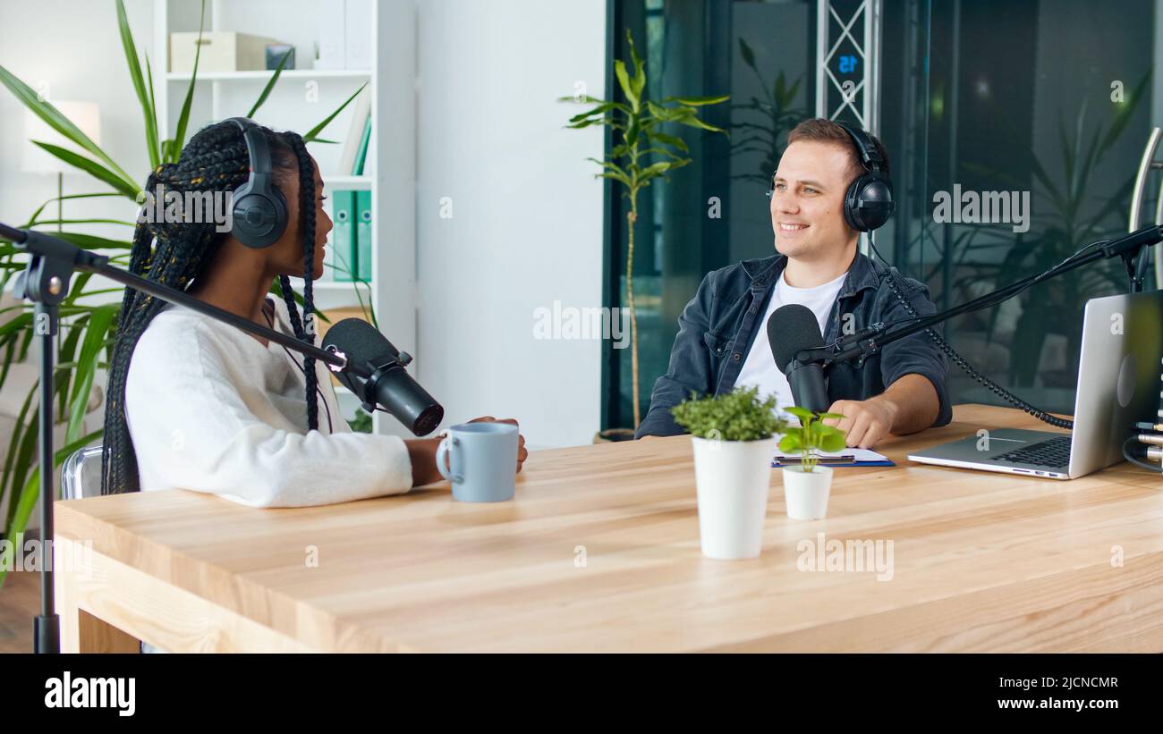 Commentator talking speaking into microphone hi-res stock photography ...