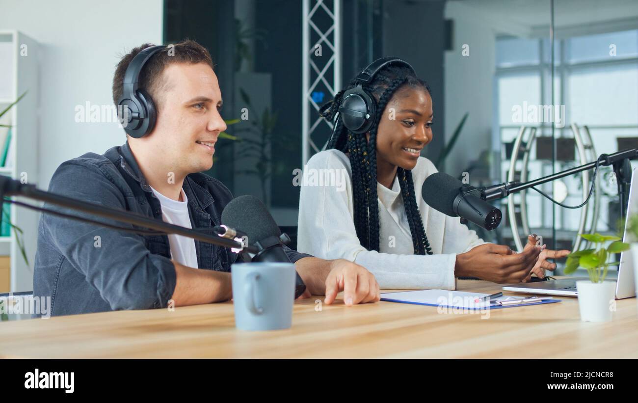 Broadcasts a Live Radio Interview With Spbd. Male Host Sharing Content ...