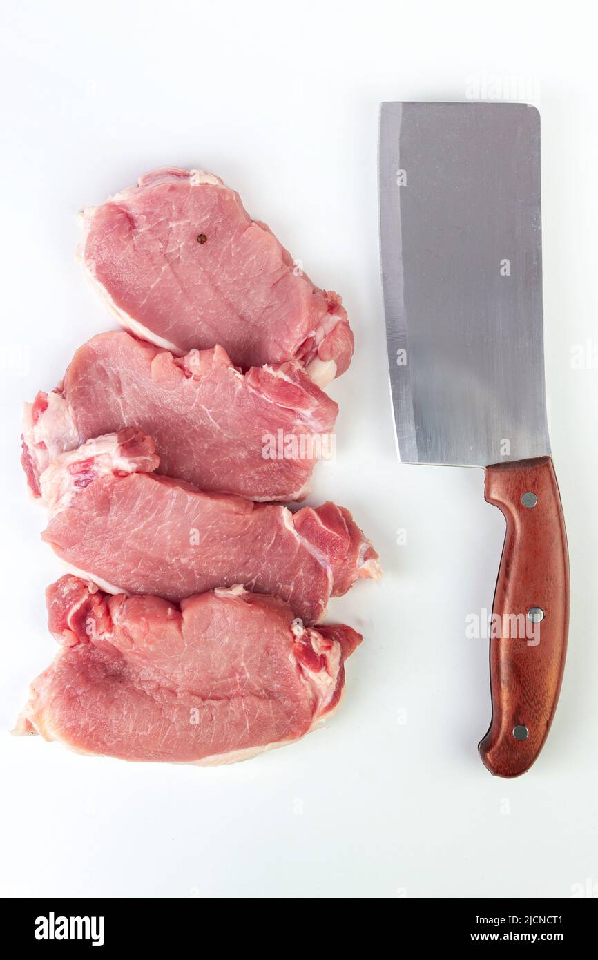 Raw pork meat for grilling on kitchen cutting, Pieces of raw roast beef ...