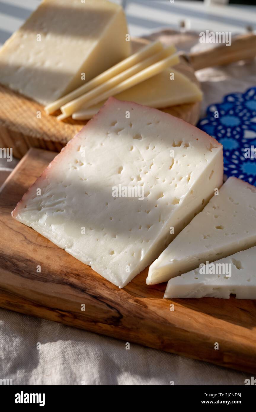 Spanish hard manchego, cow, sheep and goat cheese served outdoor in ...