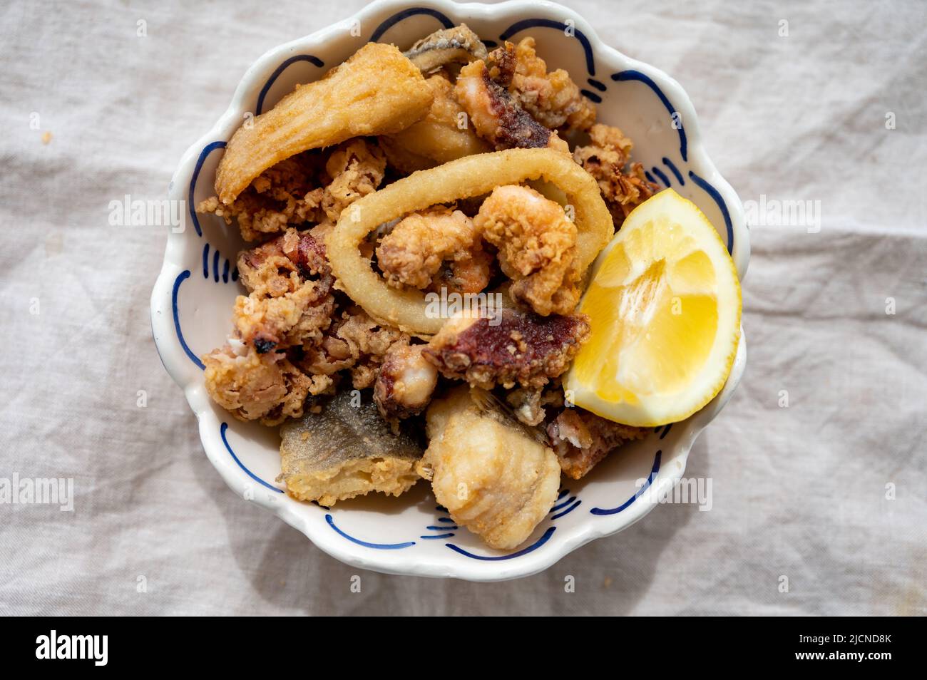Spanish sea food, cripsy deep fried baby octopus, fish, calamari rings ...