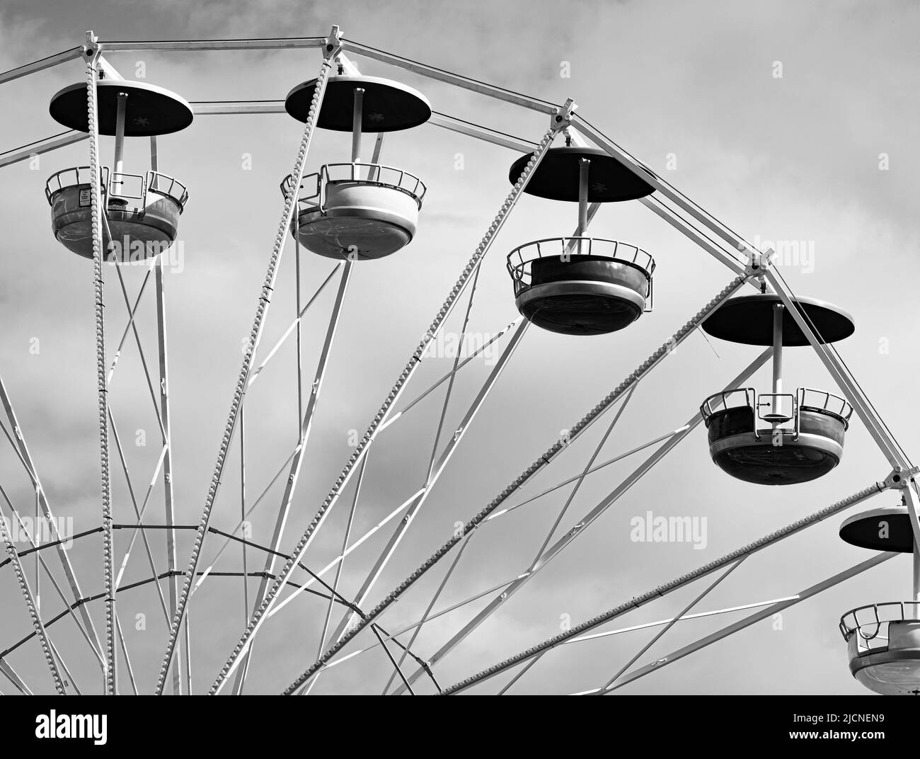 Carousel Ferris wheel with colorful cabins. Fun fair attractions. A ...