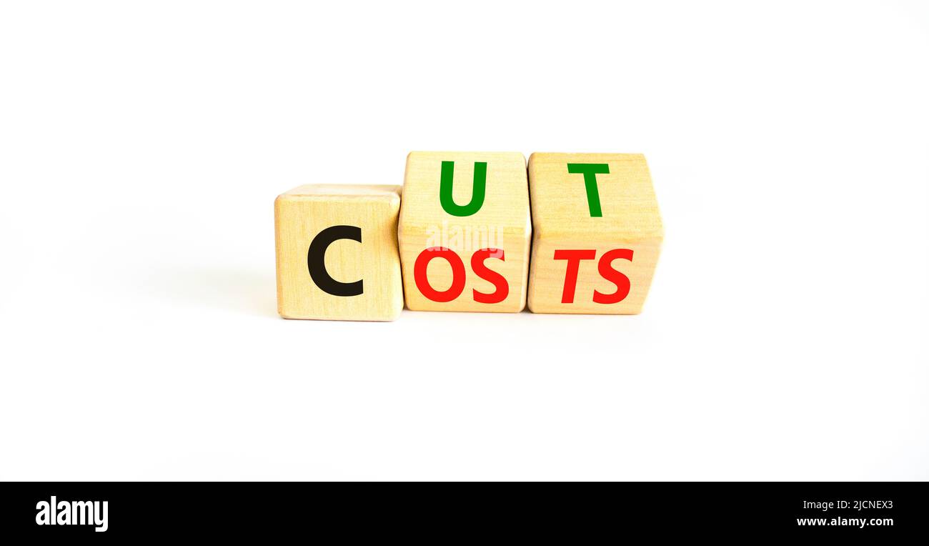 Cut costs symbol. Concept words Cut costs on wooden cubes. Beautiful ...