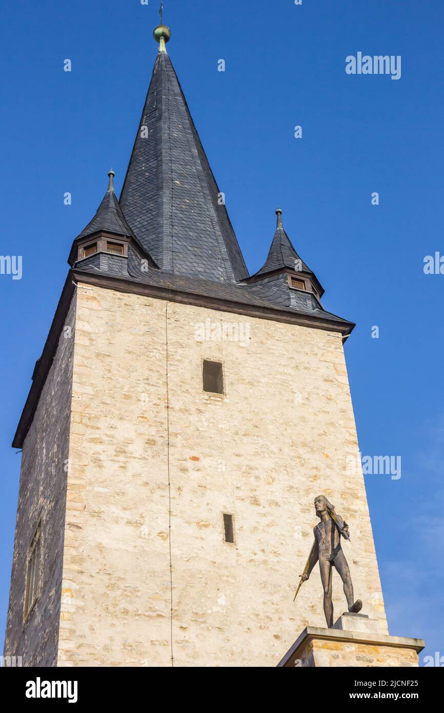 Little statue in front of the Johannistorturm tower in Aschersleben ...