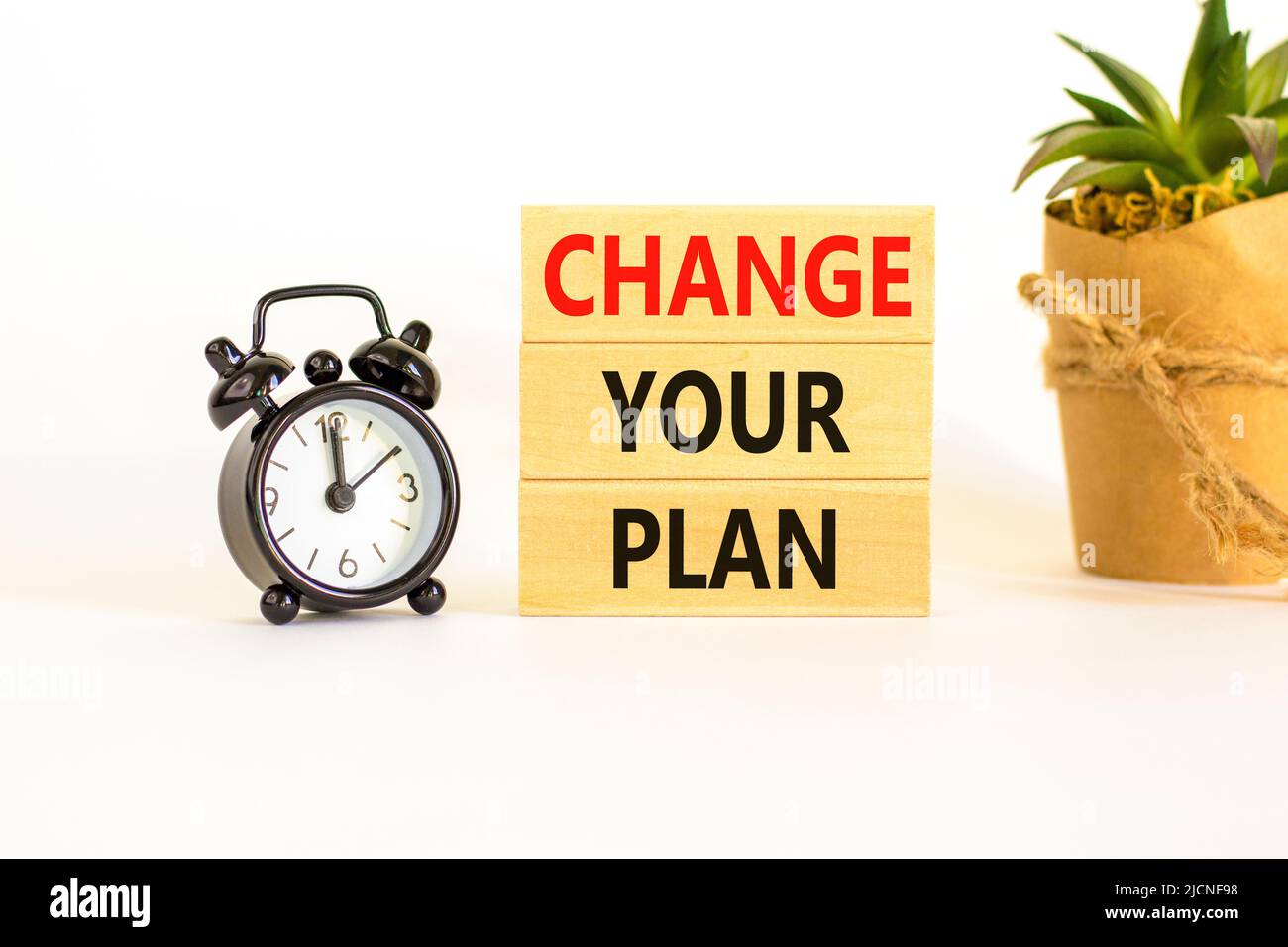 Change your plan symbol. Concept words Change your plan on wooden blocks on a beautiful white ...