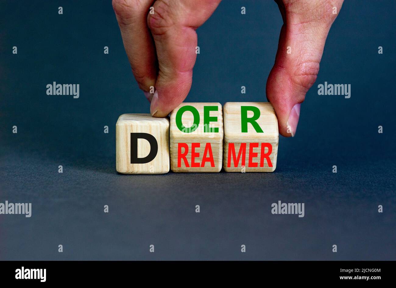 Doer or dreamer symbol. Concept words Doer or dreamer on wooden cubes ...