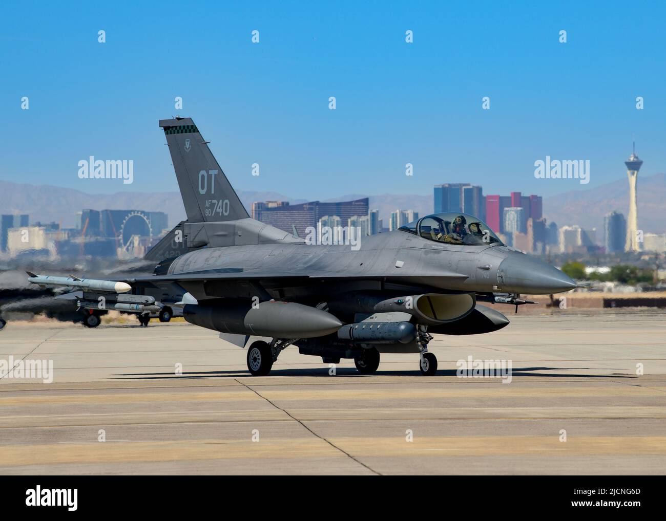 An F-16 assigned to the 422nd Test and Evaluation Squadron taxis out ...