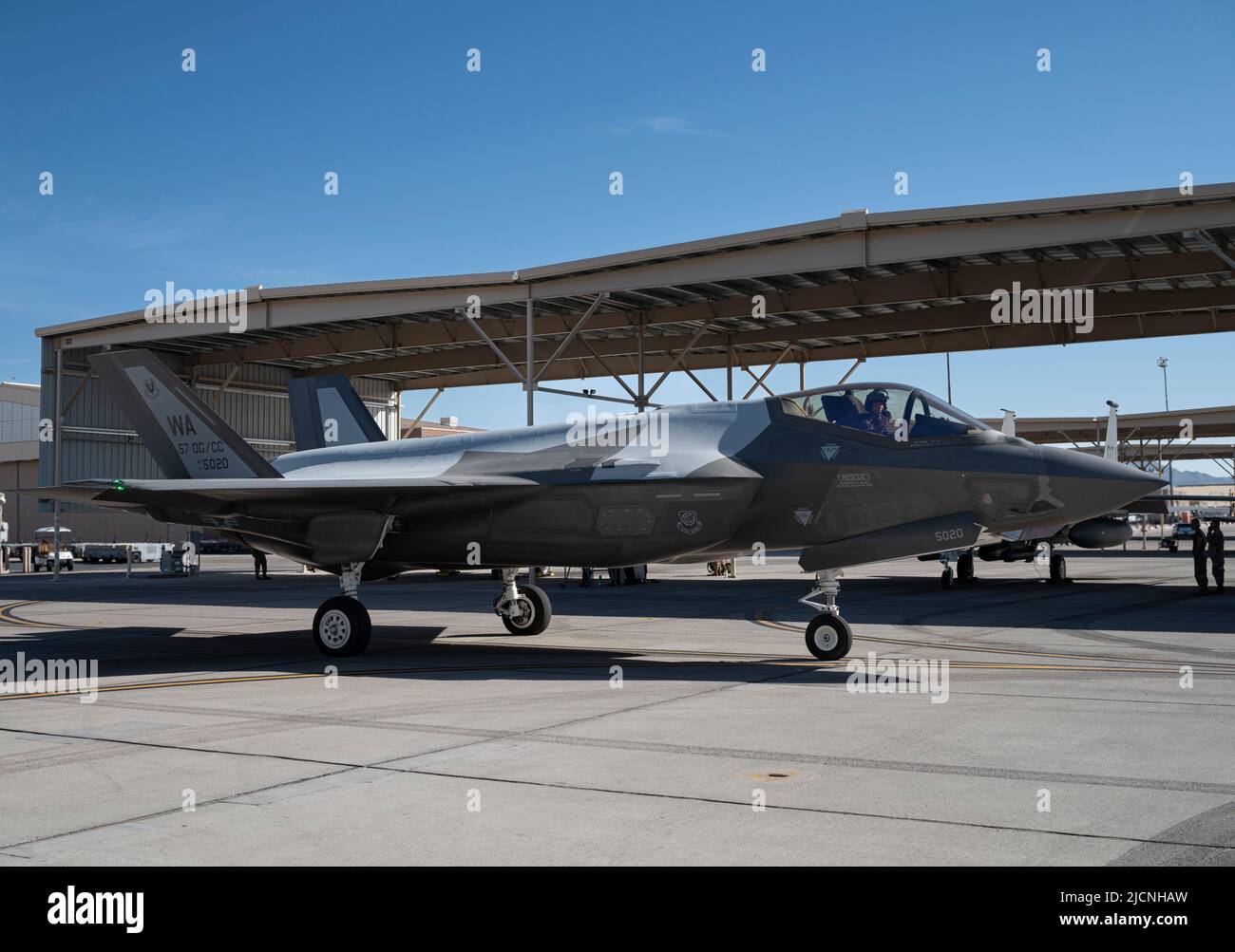 An F-35A Lightning II assigned to the 65th Aggressor Squadron taxis to ...