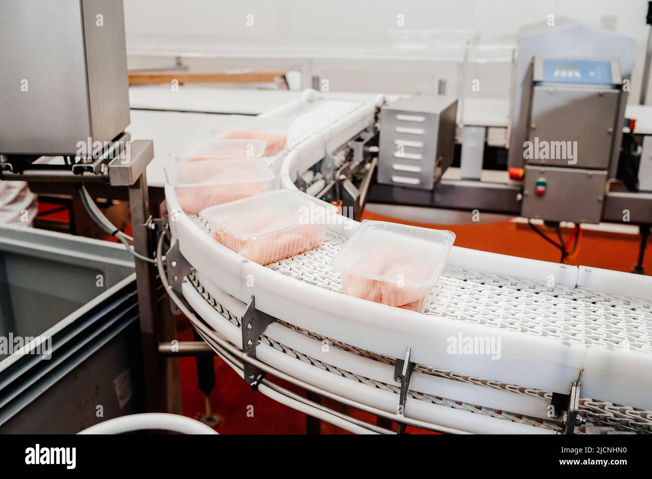 A modern plant.Factory production food from meat. Production line with ...