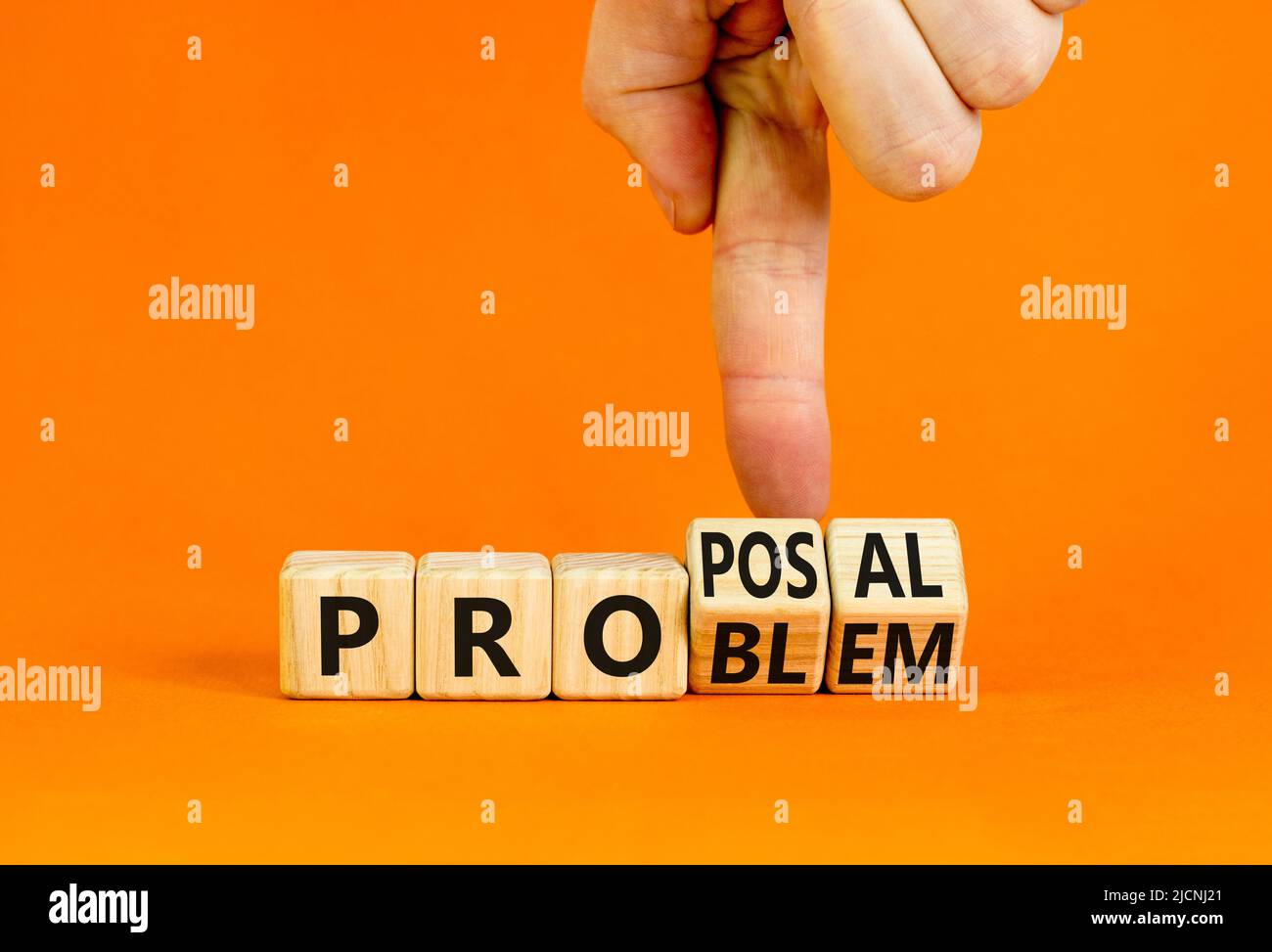 Solving a problem and making proposal symbol. Businessman turns wooden ...