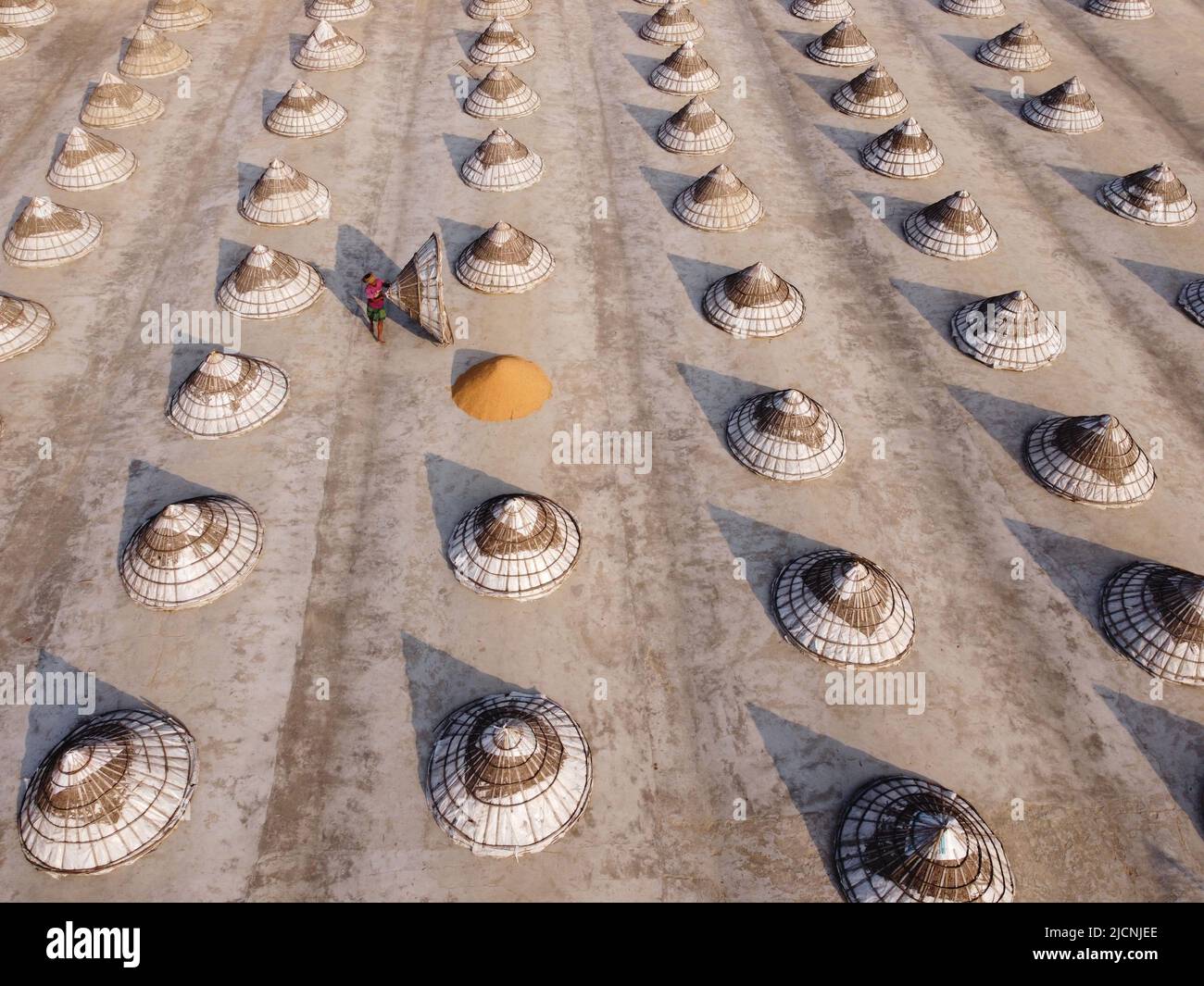 June 15, 2022, Brahmanbaria, Chittagong, Bangladesh: Worker covers ...
