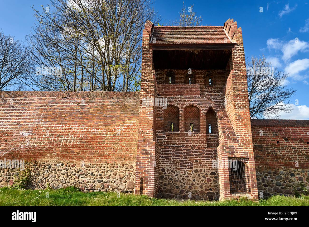 medieval fortifications with a brick tower and a stone wall in Prenzlau ...