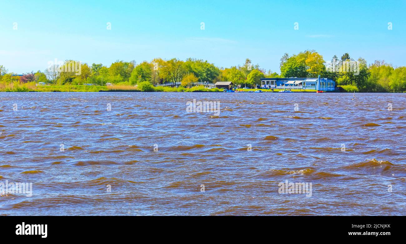 Bad Bederkesa Lake See boats and jetty on sunny day and natural ...