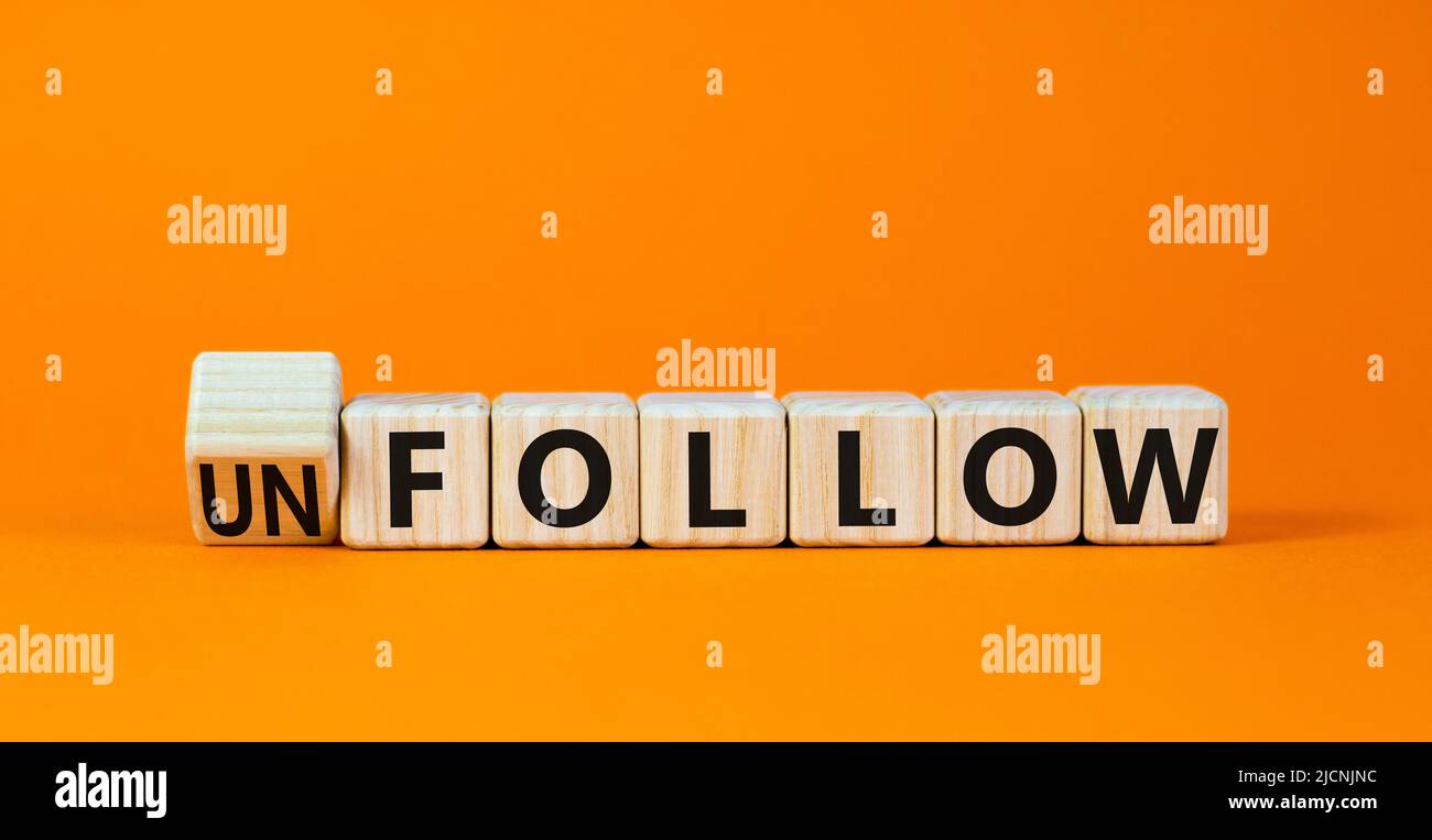 Follow or unfollow symbol. Turned wooden cubes and changed concept ...
