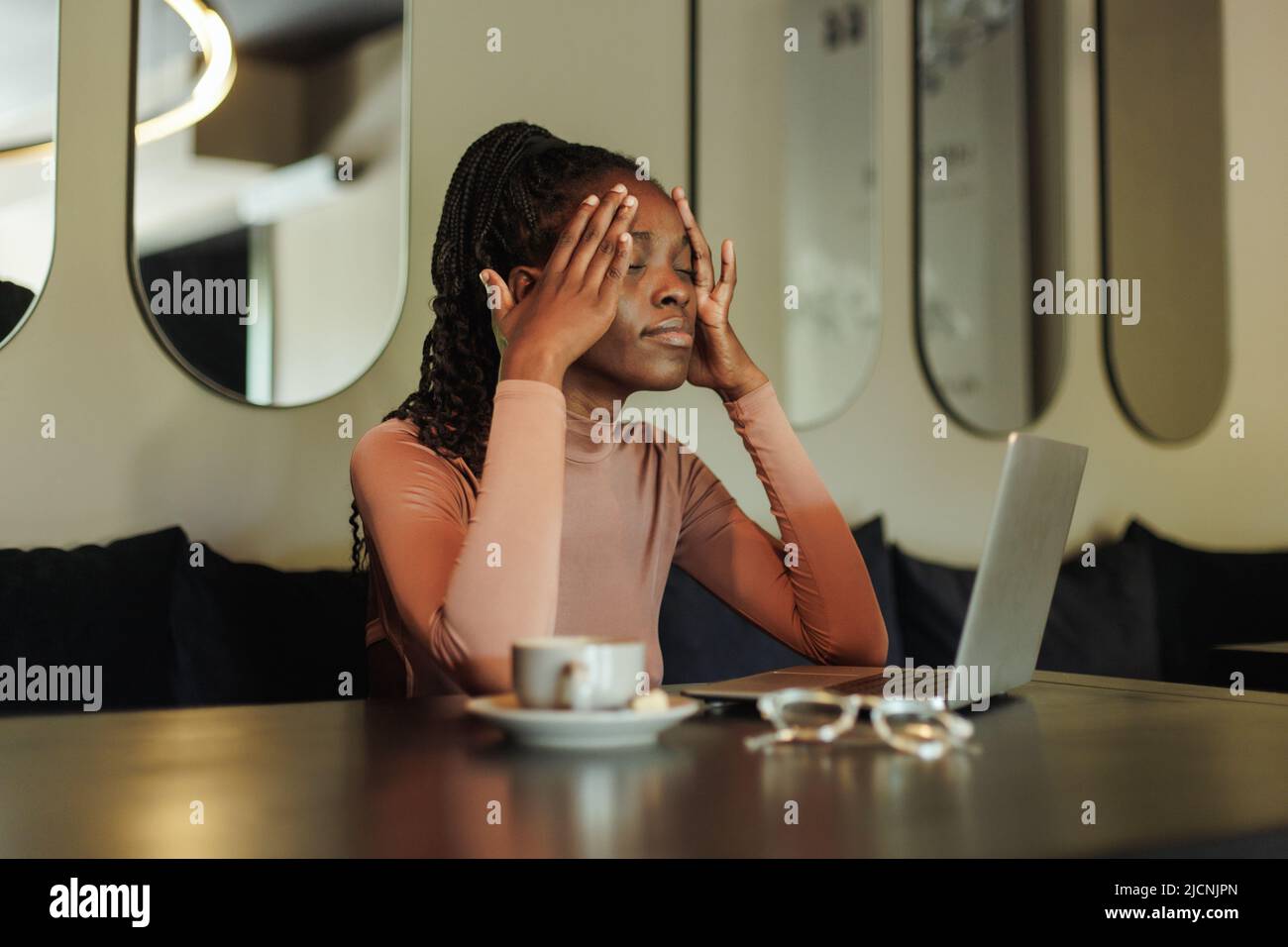 Exhausted, angry mixed race afro american businesswoman, freelancer ...