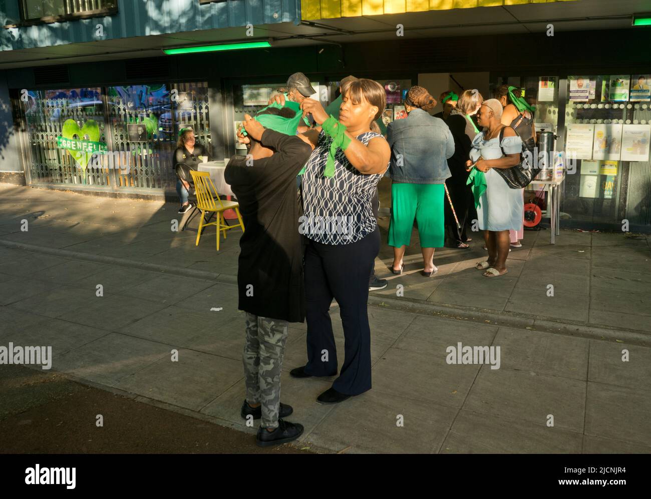 Community gathering after silent march and vigil to commemorate the ...
