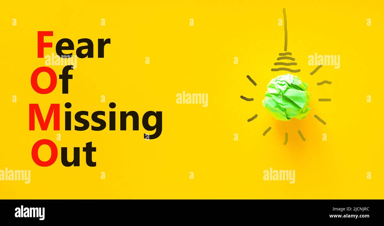 FOMO fear of missing out symbol. Concept words FOMO fear of missing out ...
