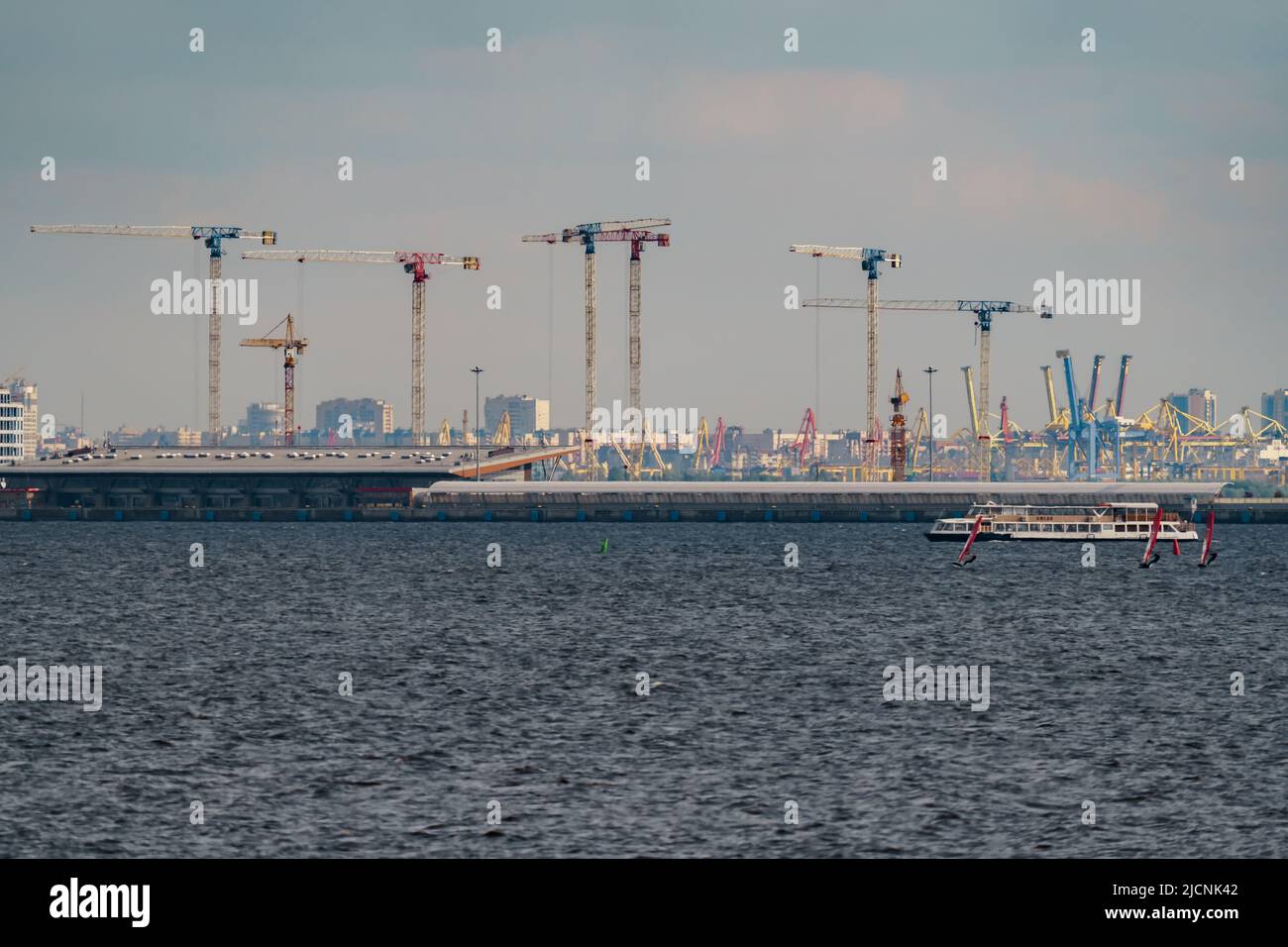 Seaport, construction cranes and cranes of the cargo port on the sea ...
