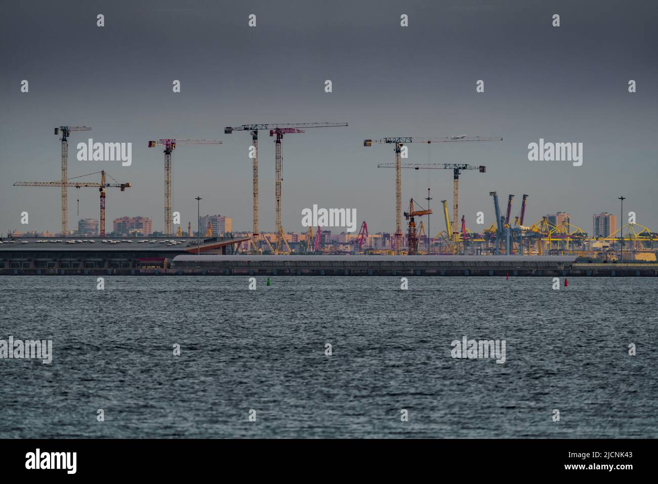 Seaport, construction cranes and cranes of the cargo port on the sea ...