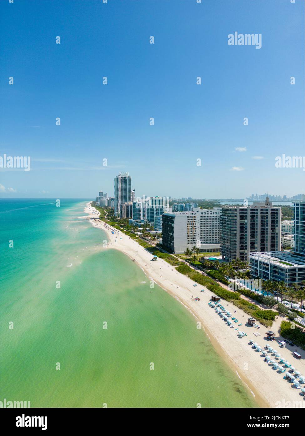 Vertical aerial photo beachfront condos Miami Beach FL near 60th Street ...