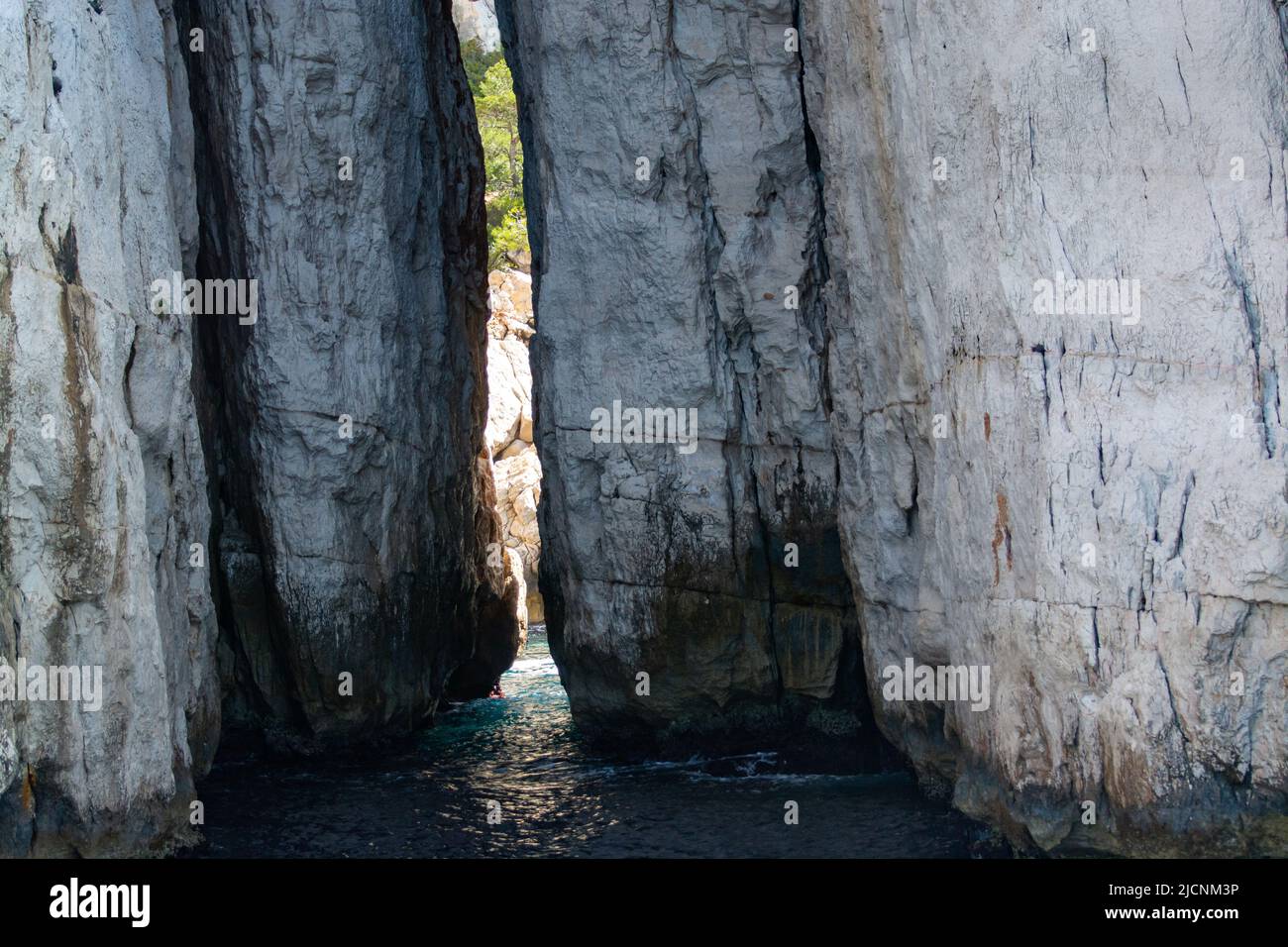 Limestone cliffs and blue sea near Cassis, boat excursion to Calanques ...