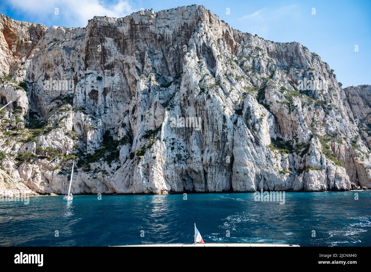 Limestone cliffs and blue sea near Cassis, boat excursion to Calanques ...